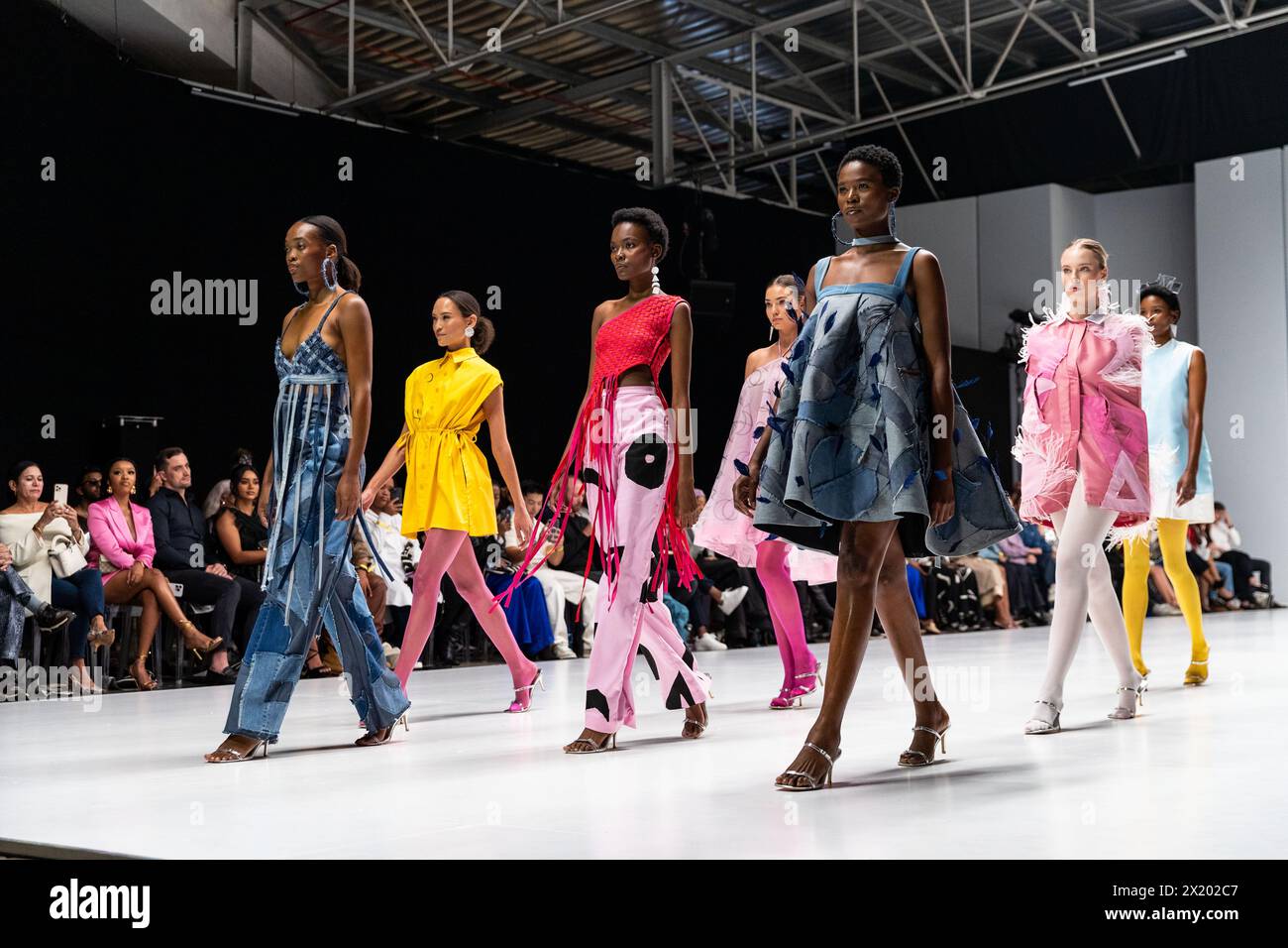 Johannesburg, South Africa. 18th Apr, 2024. Models present creations of ...