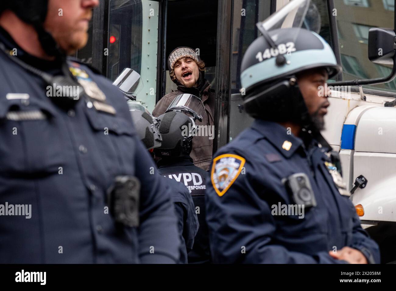 A students sings as he is being put on the NYPD bus. Pro-Palestine ...