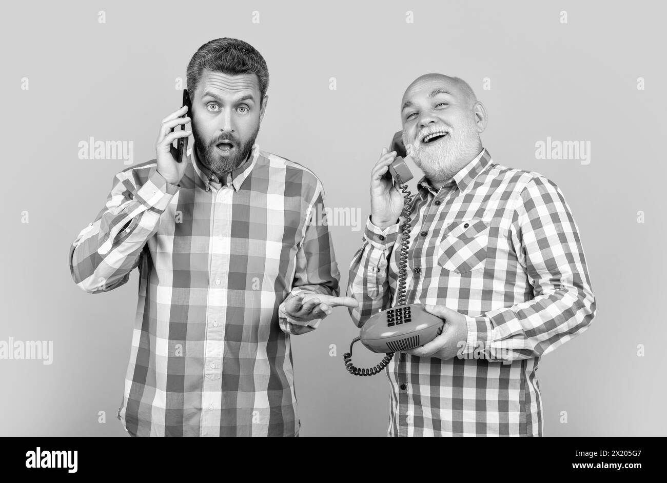 photo of men with telephone contrast call. men with telephone contrast ...