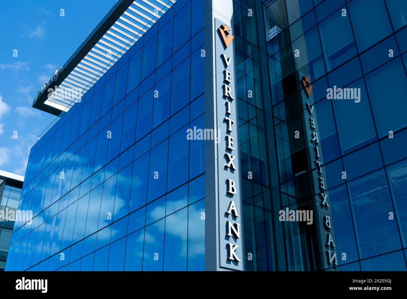 Houston, TX, USA - April 14, 2024: VERITEX BANK vertical logo sign on ...