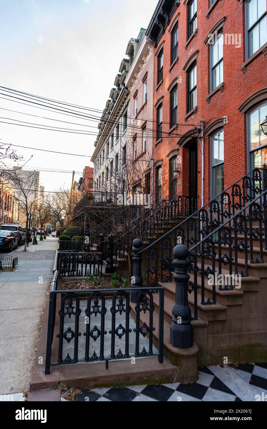 Entrance stairs to brick brownstone building. Architectural exterior ...