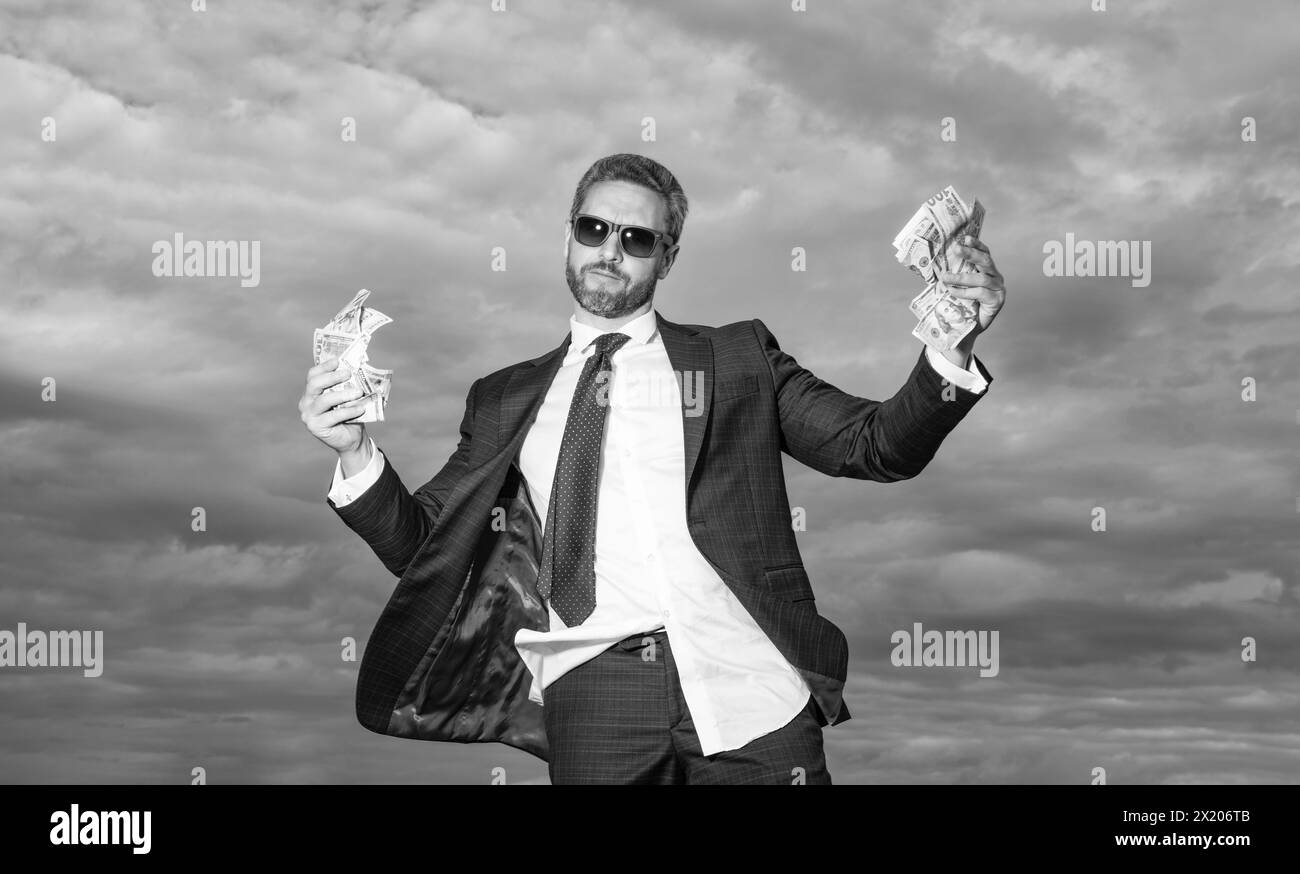 millionaire man with money on sky background. millionaire man with ...