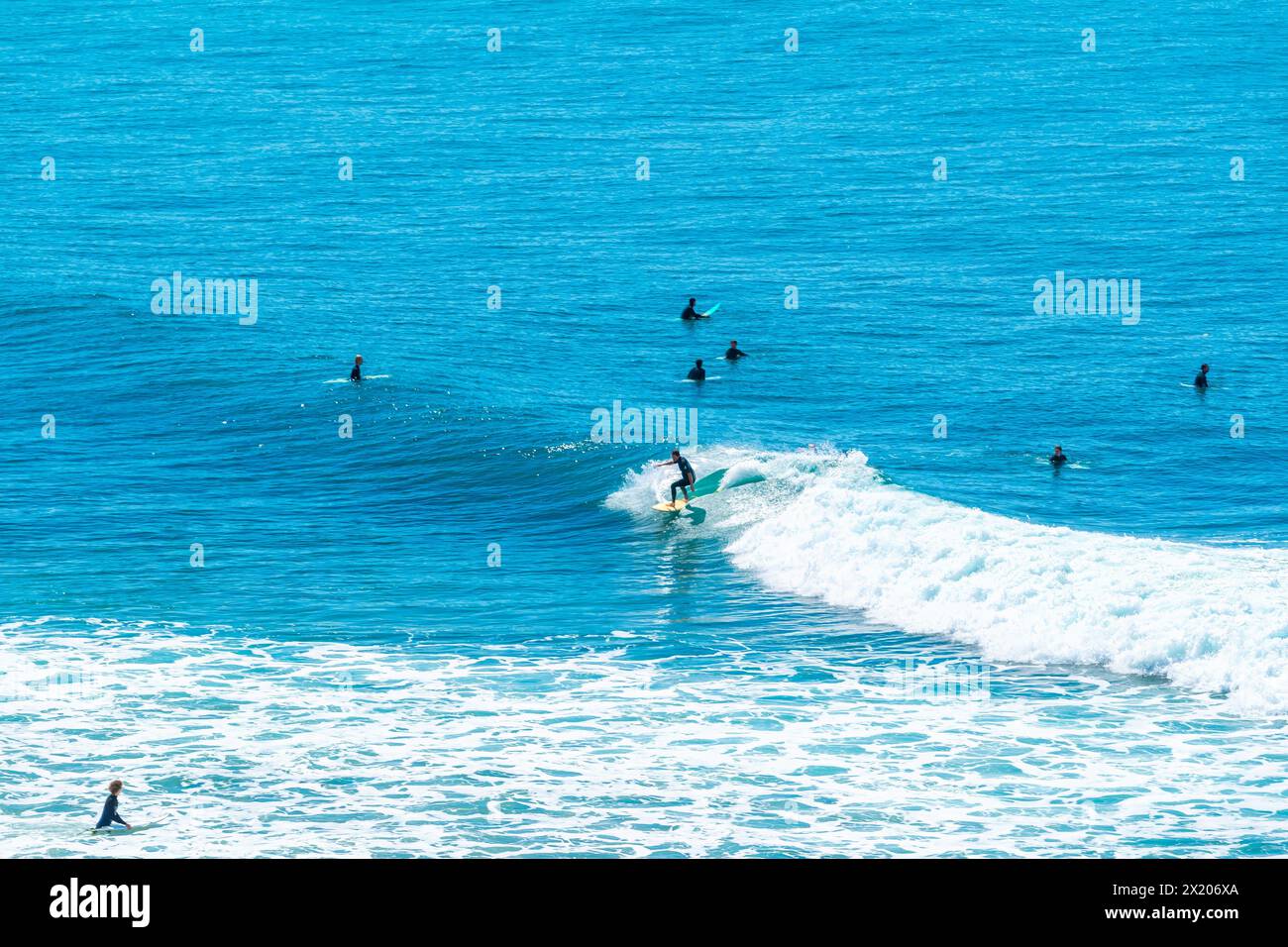 Surfers at Winkipop at Bells Beach on the Great Ocean Road in Australia ...