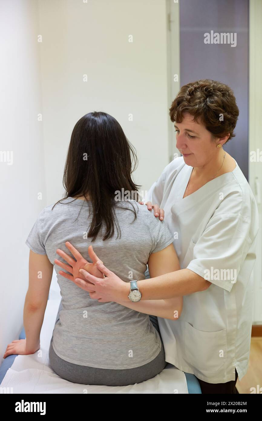 Doctor checking shoulder internal rotation, Physiotherapy medical ...