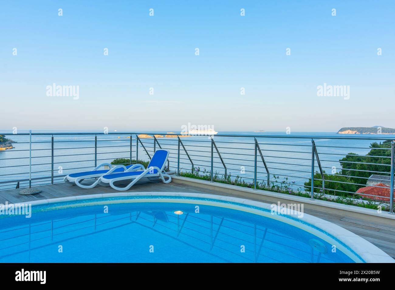 View from balcony across pool and Mediterranean Sea as distant cruise ...