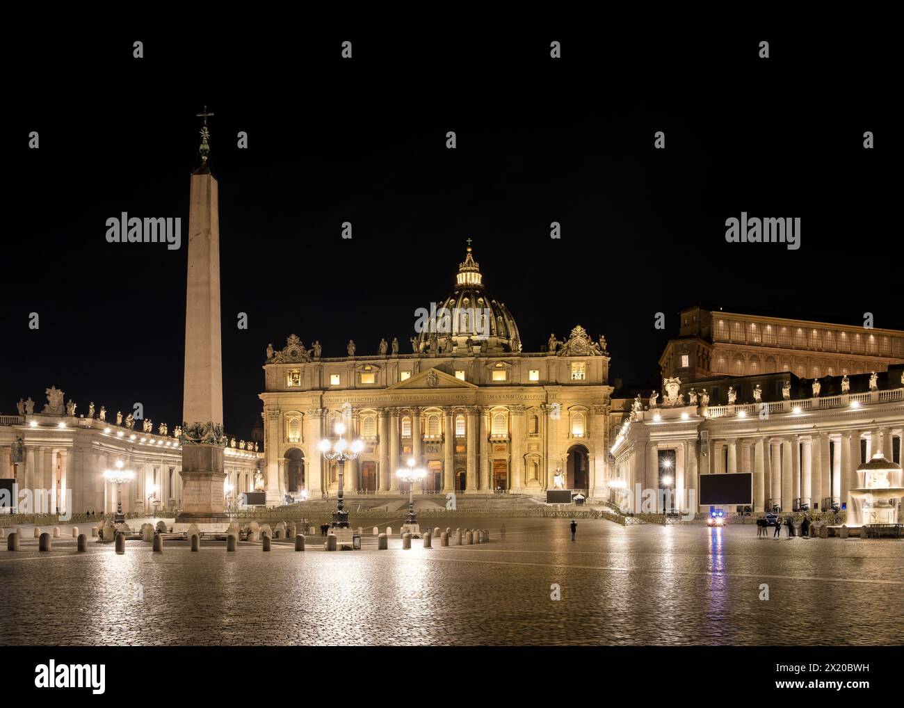 Nighttime vista of Saint Peter's Square in Vatican City, showcasing the ...