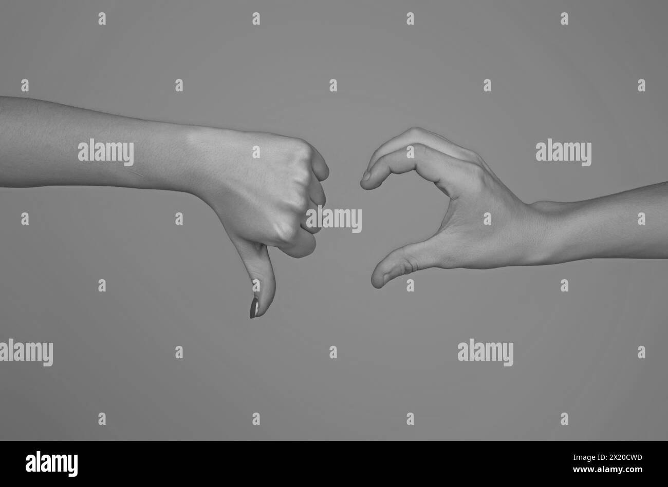 Dislike. Female and male hands in form of heart and dislike. Hands in ...