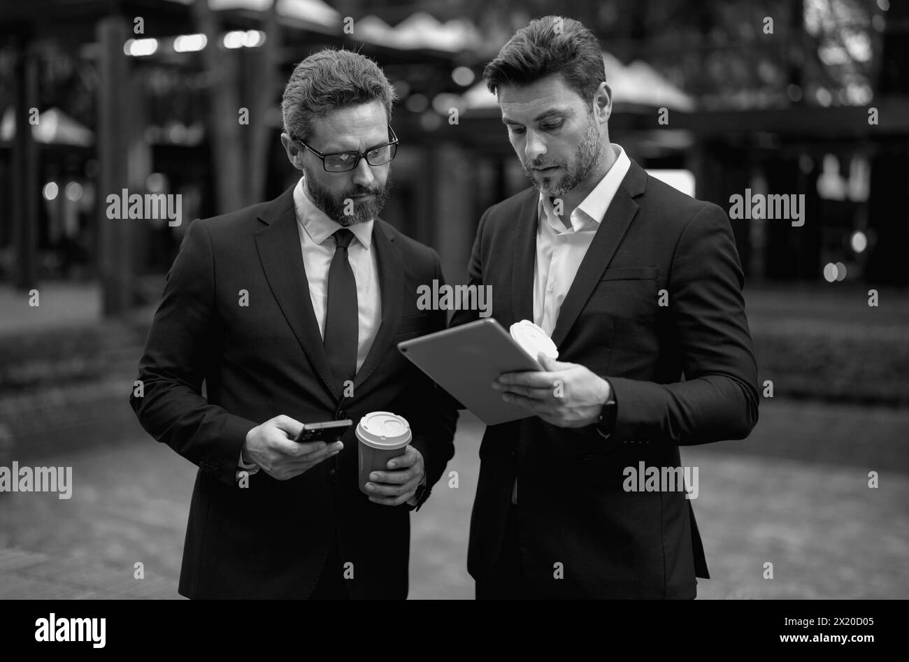 Explaining offer Black and White Stock Photos & Images - Alamy