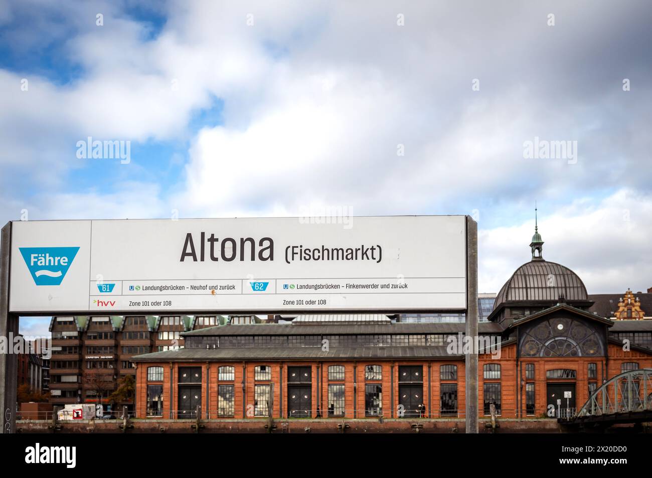 Jetty of the harbor ferry in front of the fish auction hall in the port ...
