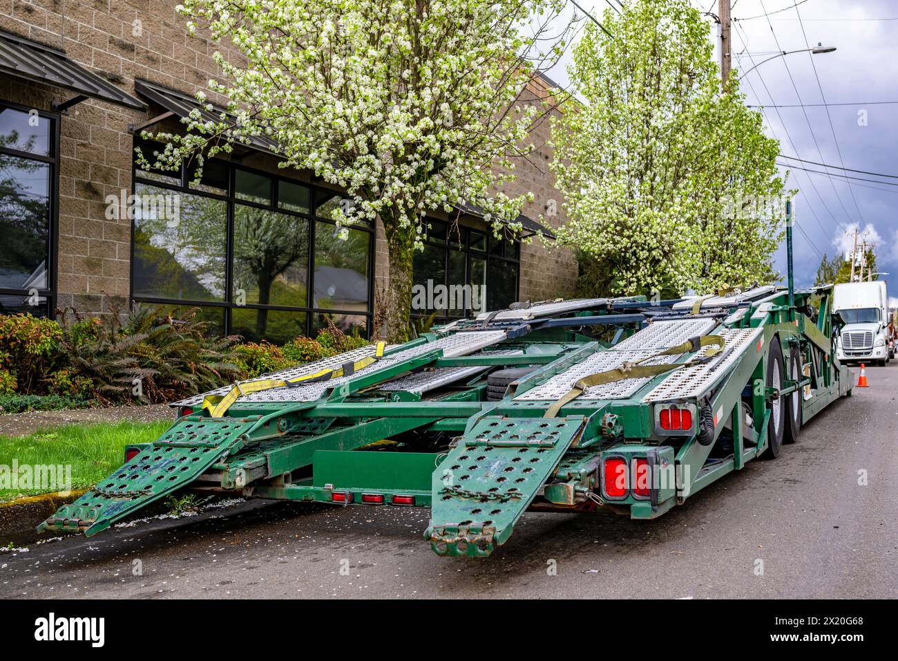 Industrial carrier white big rig semi truck tractor standing opposite ...