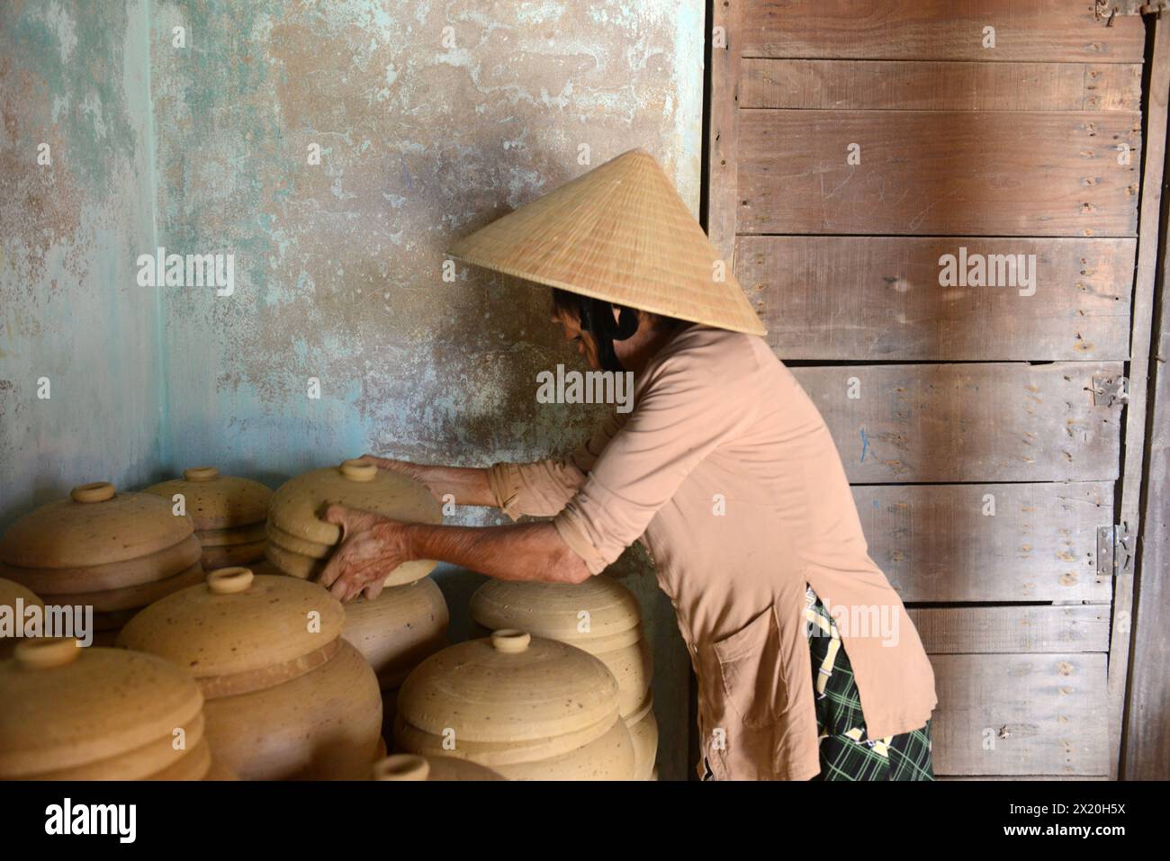Traditional Clay pots production at Thanh Ha pottery village in Hoi An ...