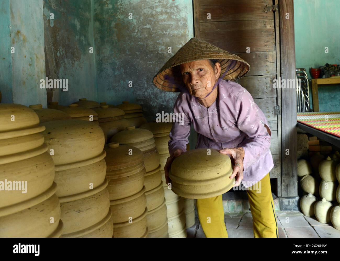 Traditional Clay pots production at Thanh Ha pottery village in Hoi An ...