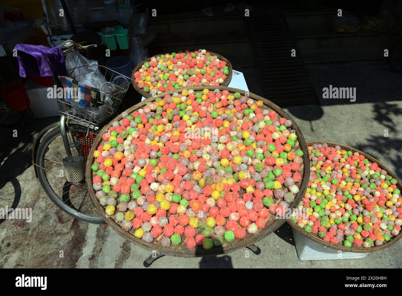 Drying the colorful balls used in Cloud / smoke ice cream. Hoi An ...