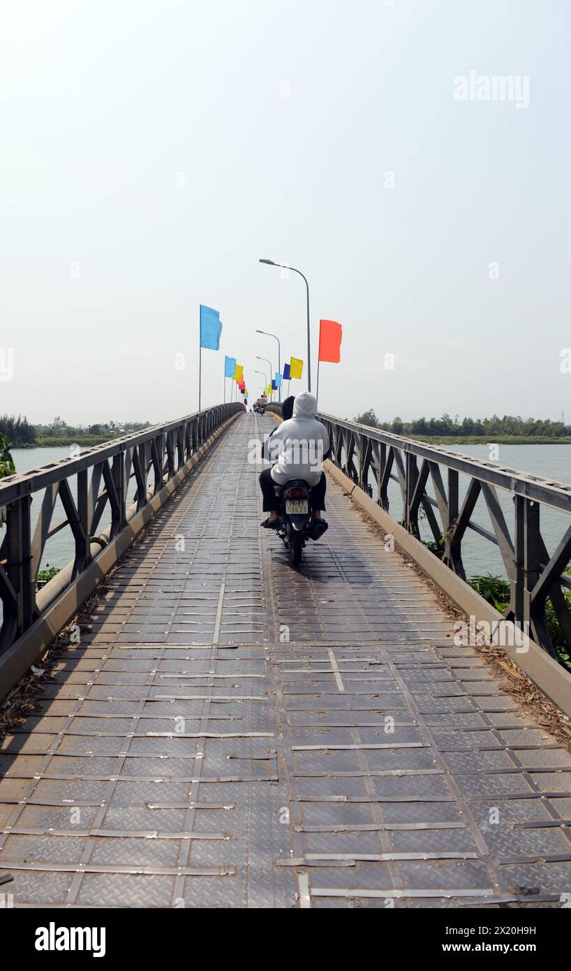 The narrow bridge connecting Cam Kim Island and An Hoi Islet over the ...