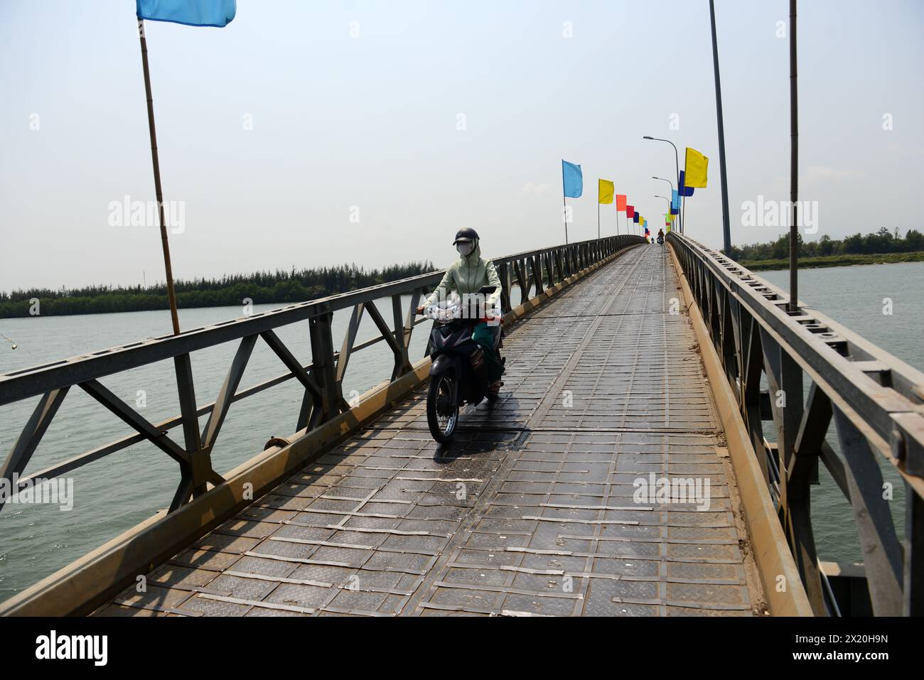 The narrow bridge connecting Cam Kim Island and An Hoi Islet over the ...