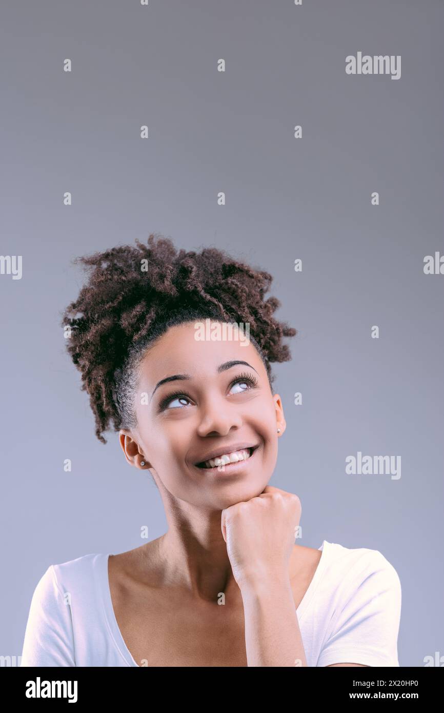 Woman points finger upward in hi-res stock photography and images - Alamy