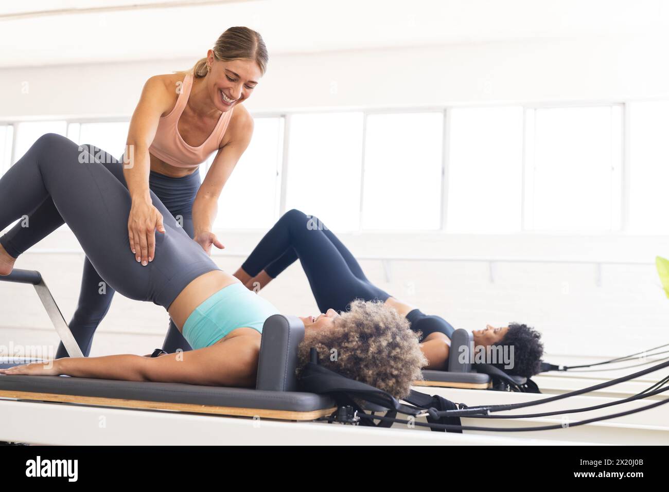 Diverse group of women practicing pilates in studio, copy space Stock ...