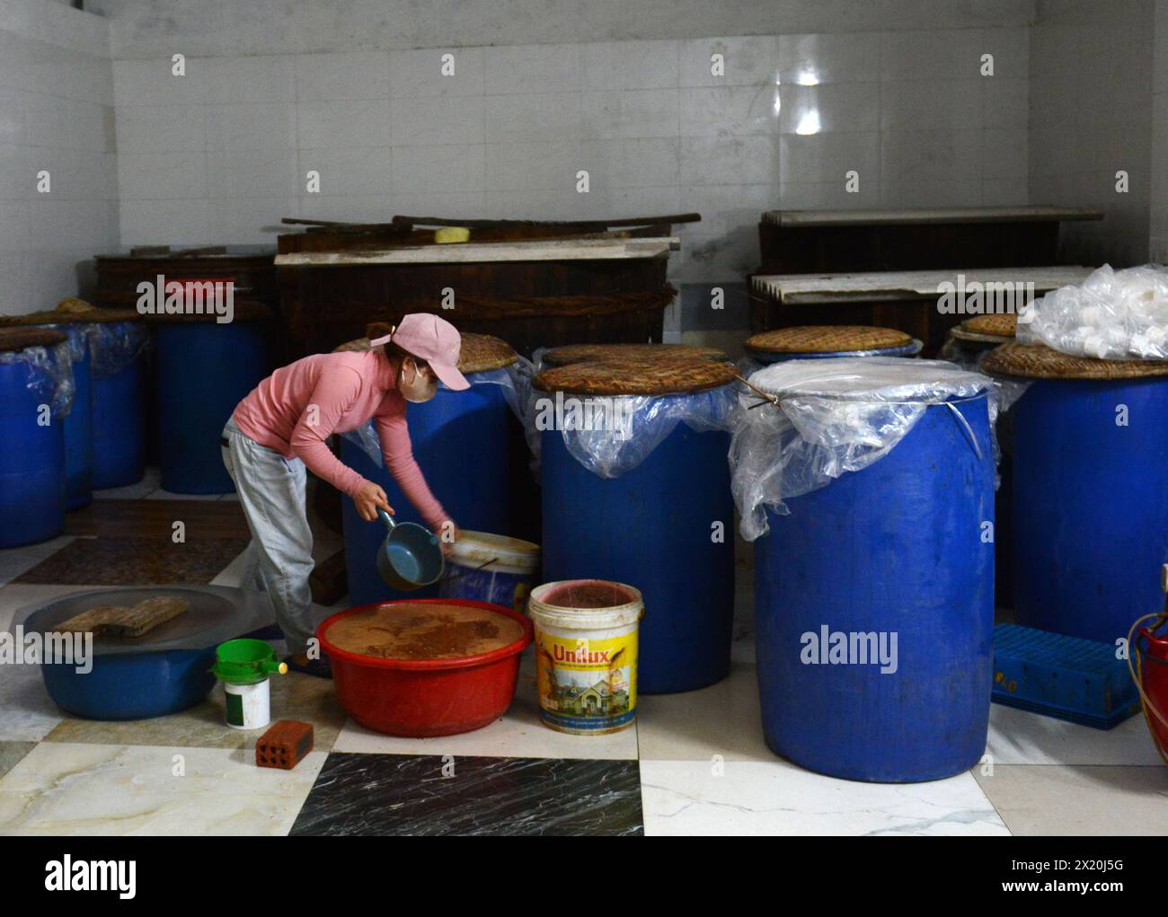 A small family run fish sauce factory in a village in Bàn Thạch, Hoi An ...