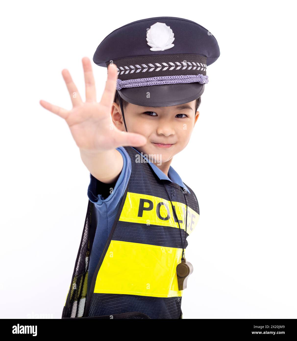 child dressed as a police officer standing and showing stop sign Stock ...