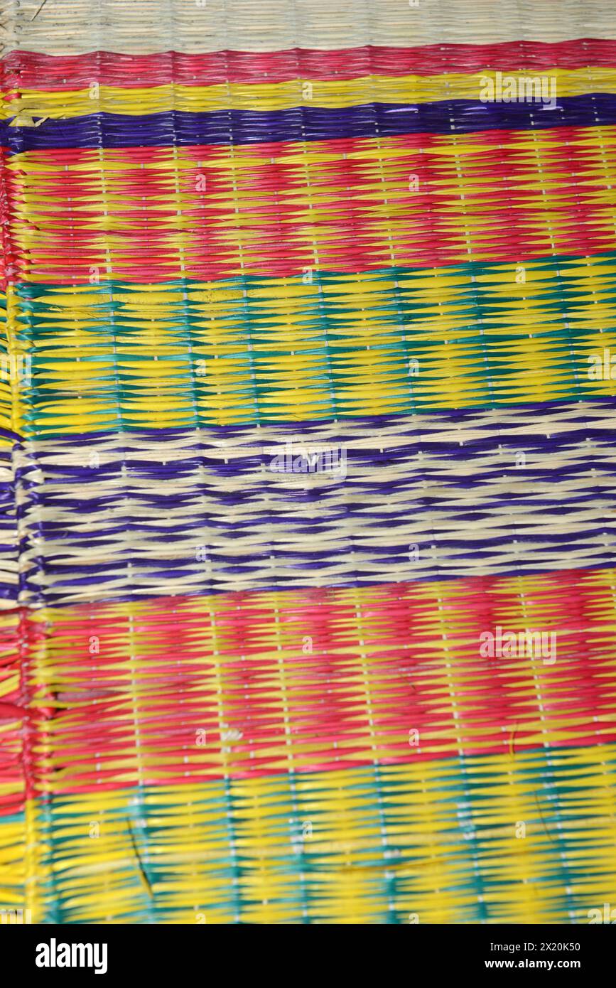 A mat weaver working in his home in a small village in Cẩm Kim, Hội An ...