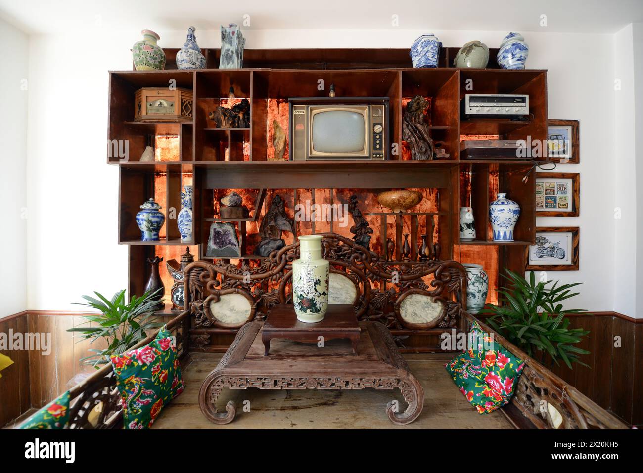 A traditional Vietnamese living room space above the floor in a house ...