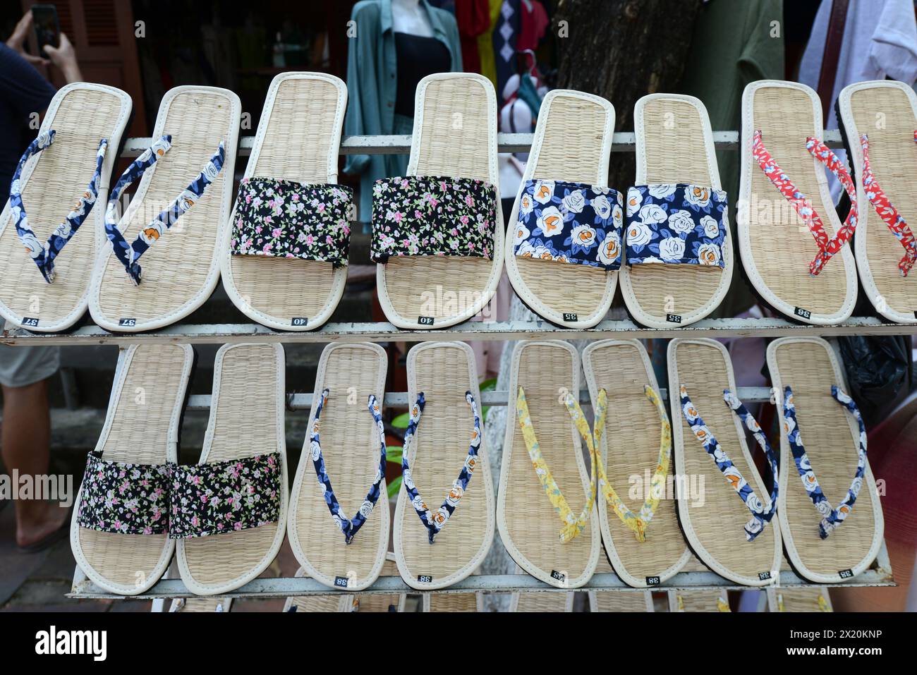 Traditional Vietnamese sandals & slippers displayed by a shop in the ...