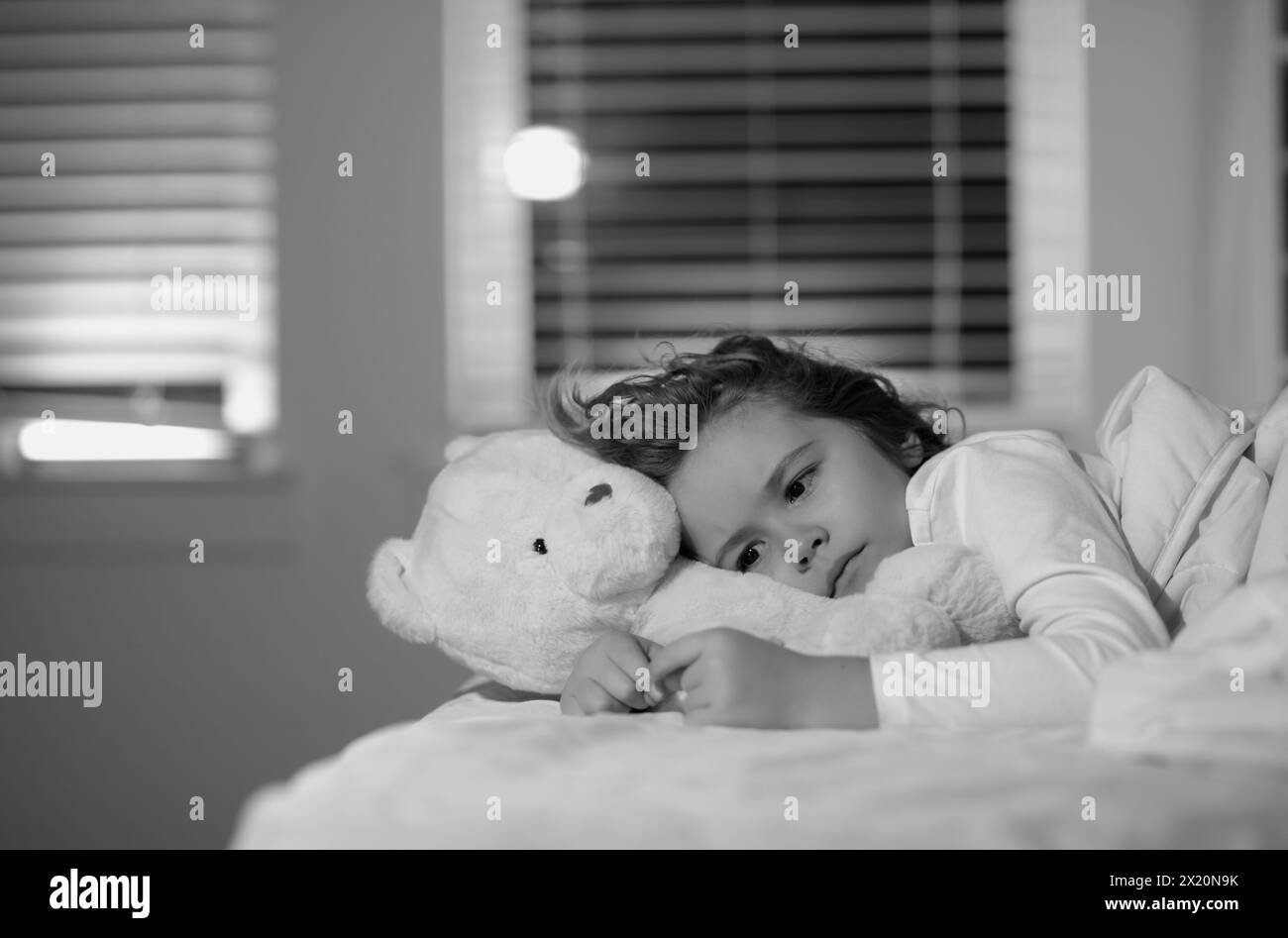 Child cannot sleep on bed at night in bedroom. Kid having sleeplessness ...