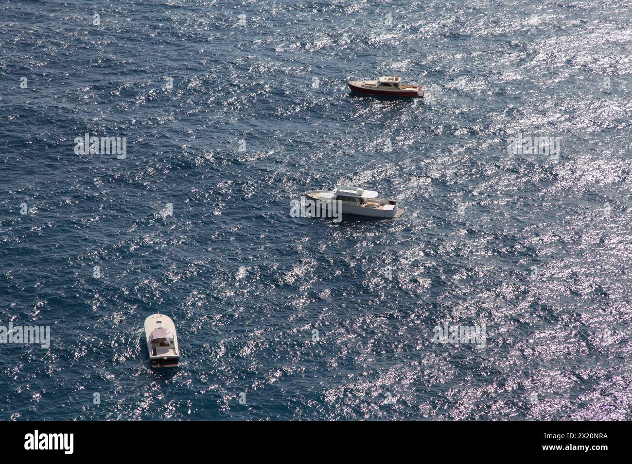 Yacht breezing through the italian ocean blue sea in Capri Stock Photo ...