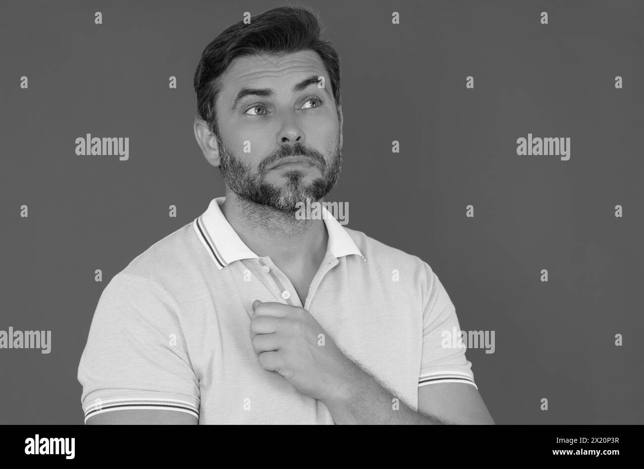 Portrait of thoughtful guy making choice. Handsome man thinking on ...