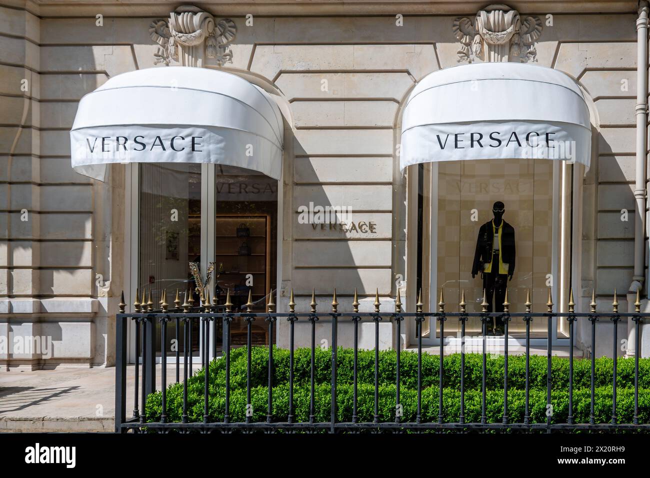 Exterior view of a Versace boutique in the Champs-Elysees district of ...