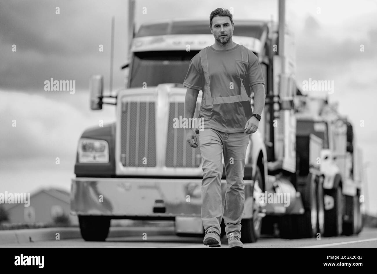 Men driver near lorry truck. Man owner truck driver in safety vest near ...