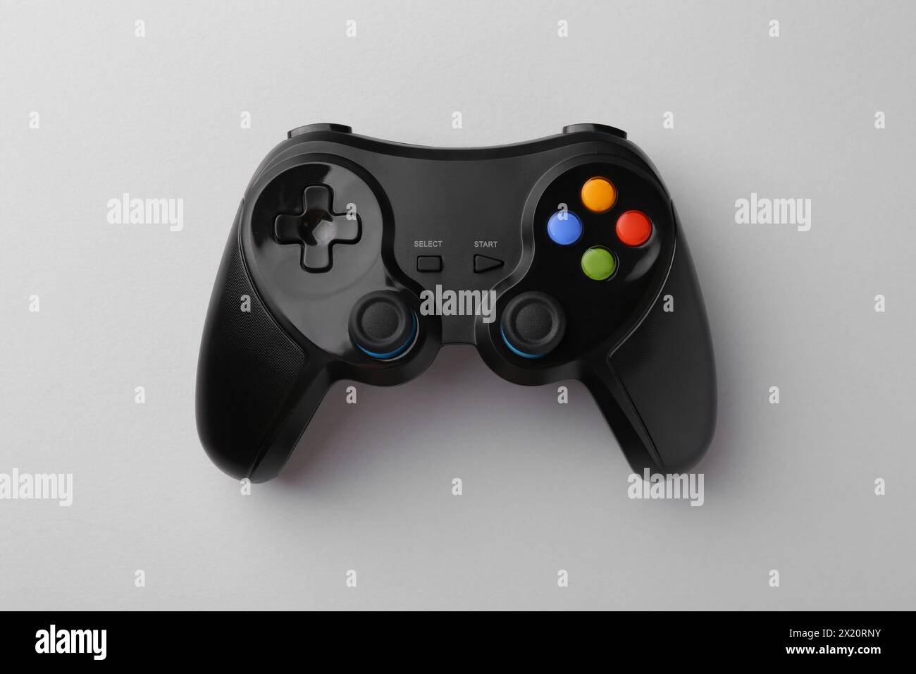Wireless game controller on light grey background, top view Stock Photo ...