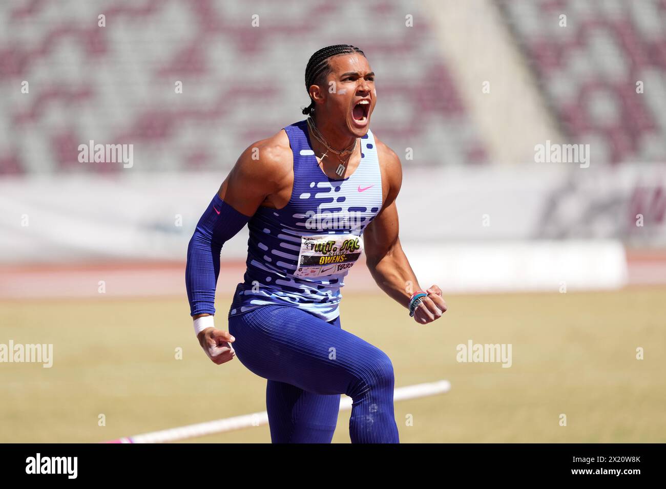 Ayden Owens-Delerme celebrates after clearing 16-8 3/4 (5.10m) in the ...