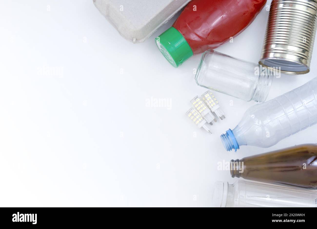 Various recyclable items laid out for sorting Stock Photo - Alamy