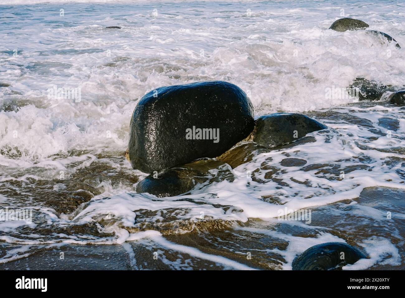 Morning tranquility captured in a serene coastal image, featuring small ...
