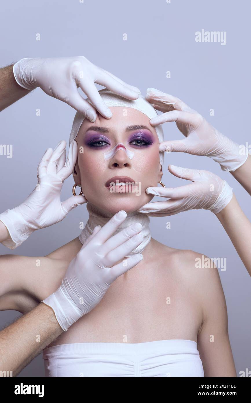 Poster for medical clinic. Beautiful young woman with makeup and hands ...