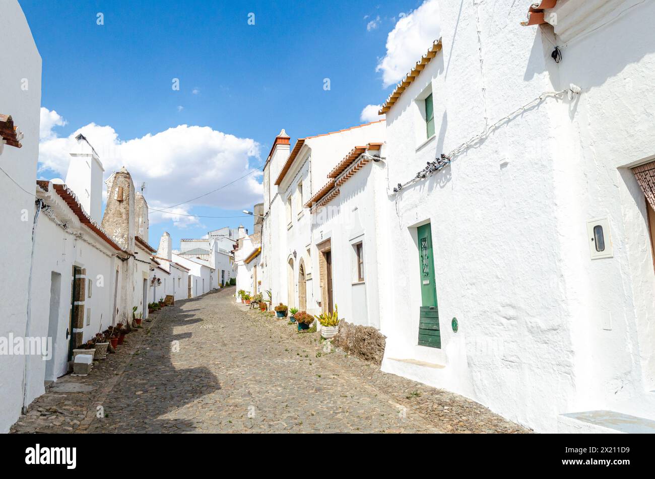 street with houses of traditional architecture in the medieval town of ...