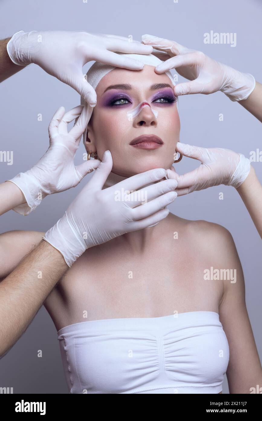 Poster for medical clinic. Beautiful young woman with makeup and hands ...