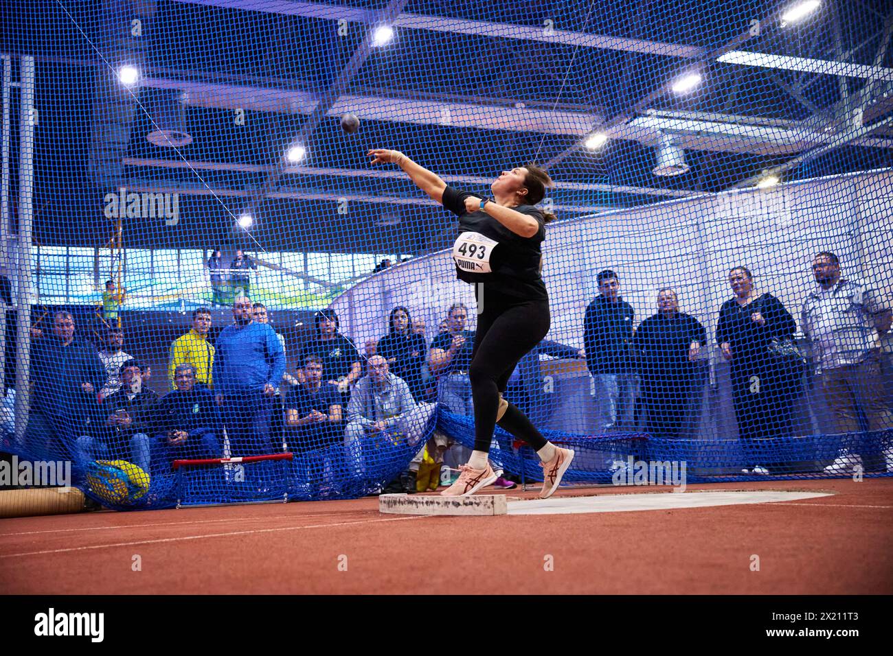 Ukrainian shot put competition. Female athlete throws a 4 kg iron ball ...