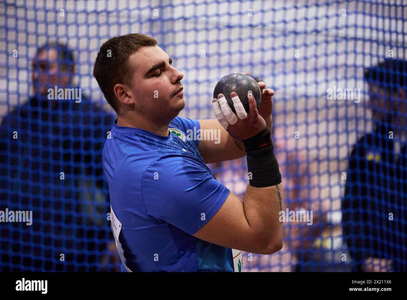 Professional shot putter prepares for a throw at Championship of ...