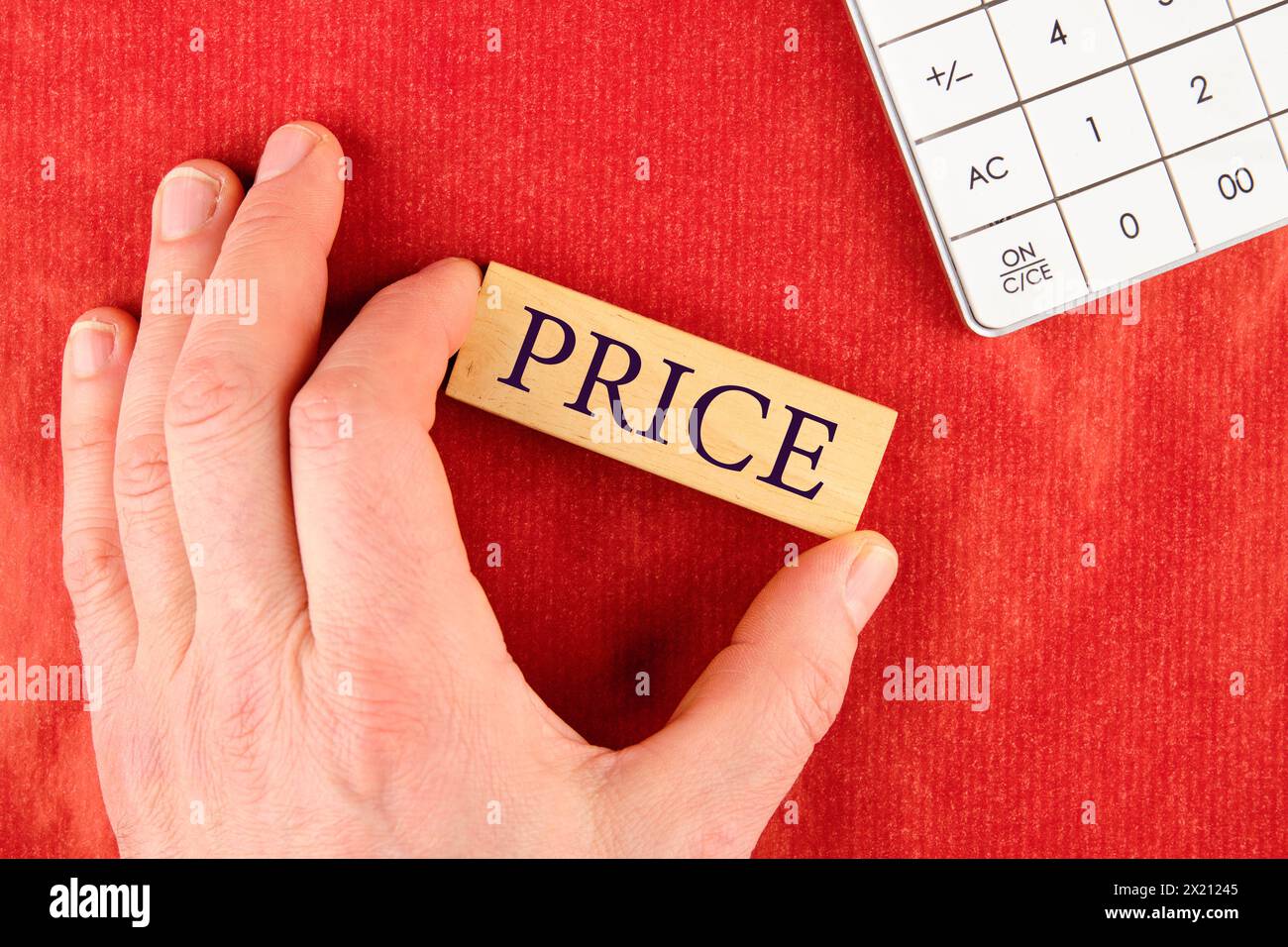 Price word text is made up of wooden blocks on a red background Stock ...