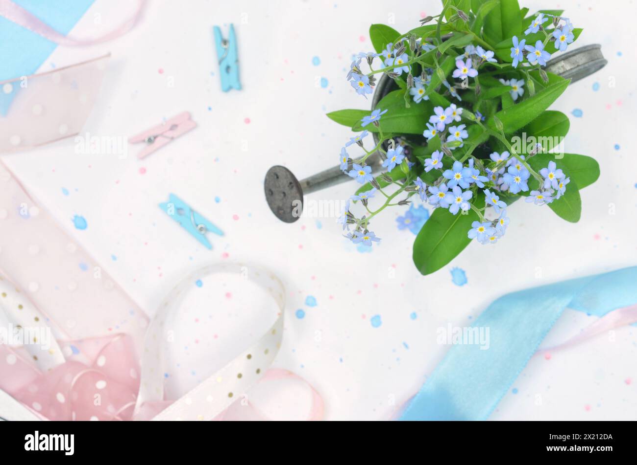 Bunch of forget-me-nots with blue and pink decorations on dot ...