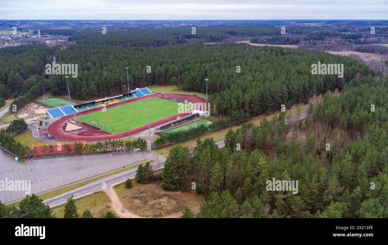 aerial view from drone of a football stadium with a football field ...