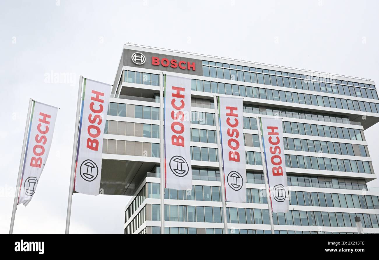 Renningen, Germany. 18th Apr, 2024. Flags with the logo of the Bosch ...