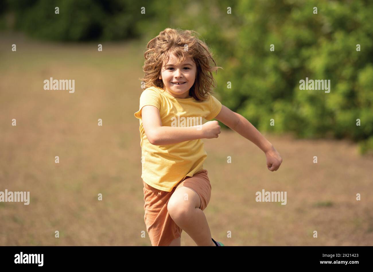 Kid running in summer street. Child enjoy run. Little boy running on ...