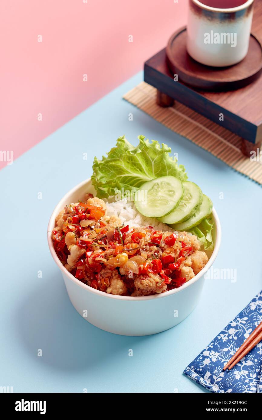 chicken sambal matah rice bowl Stock Photo - Alamy