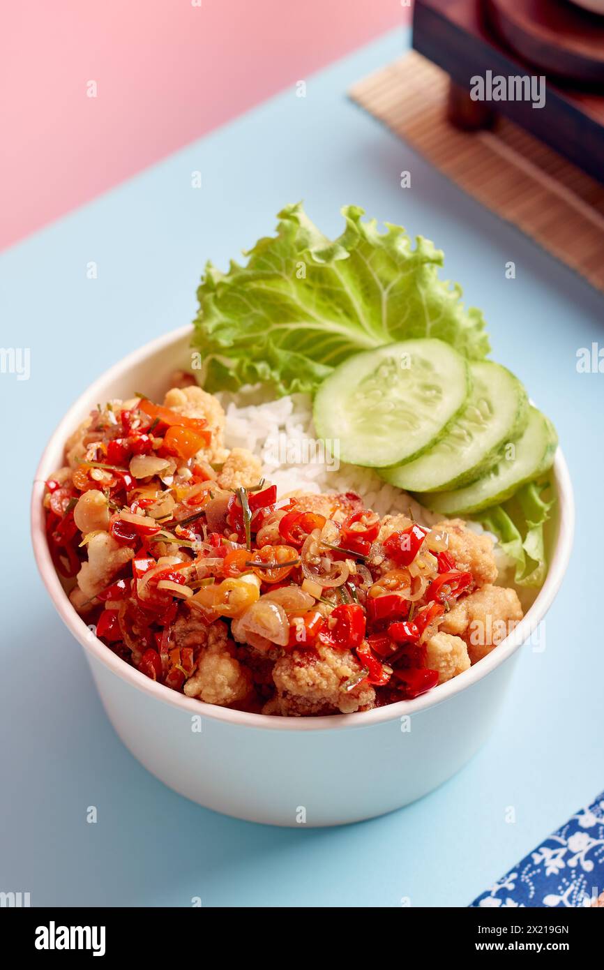 chicken sambal matah rice bowl Stock Photo - Alamy