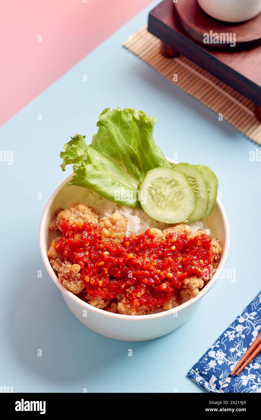 chicken sambal rice bowl Stock Photo - Alamy