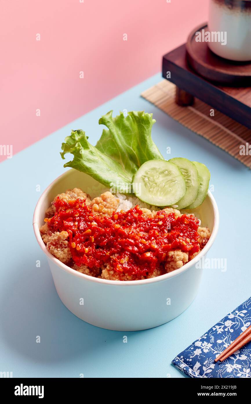 chicken sambal rice bowl Stock Photo - Alamy
