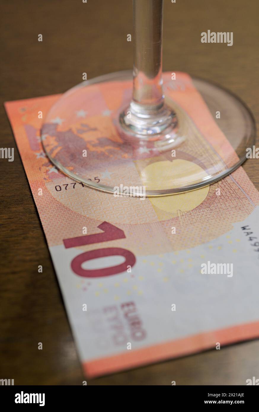 ten euro banknote under chalice Stock Photo - Alamy